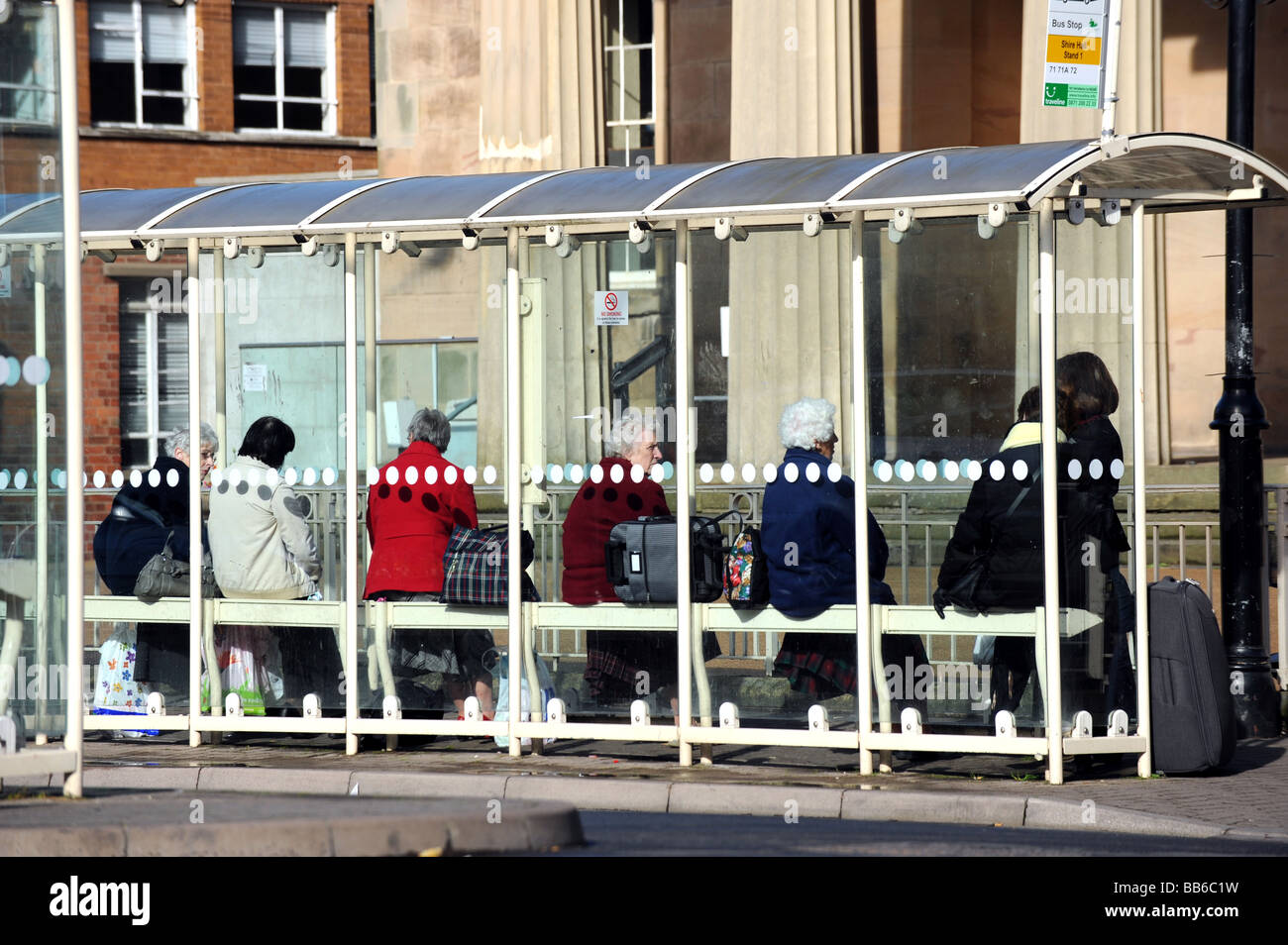 Bus stop queue hi-res stock photography and images - Alamy