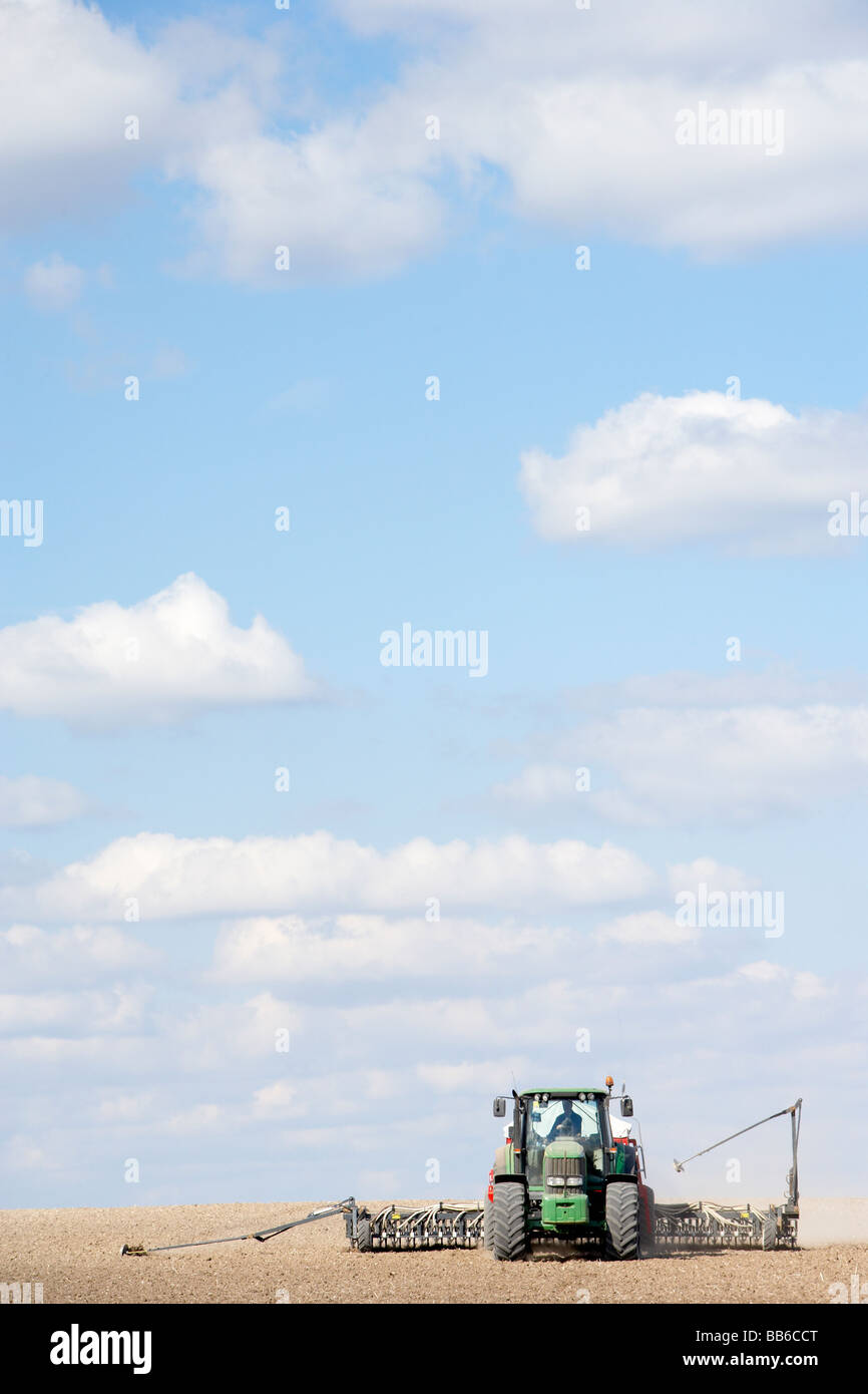 Tractor Planting Seed In Field Stock Photo - Alamy