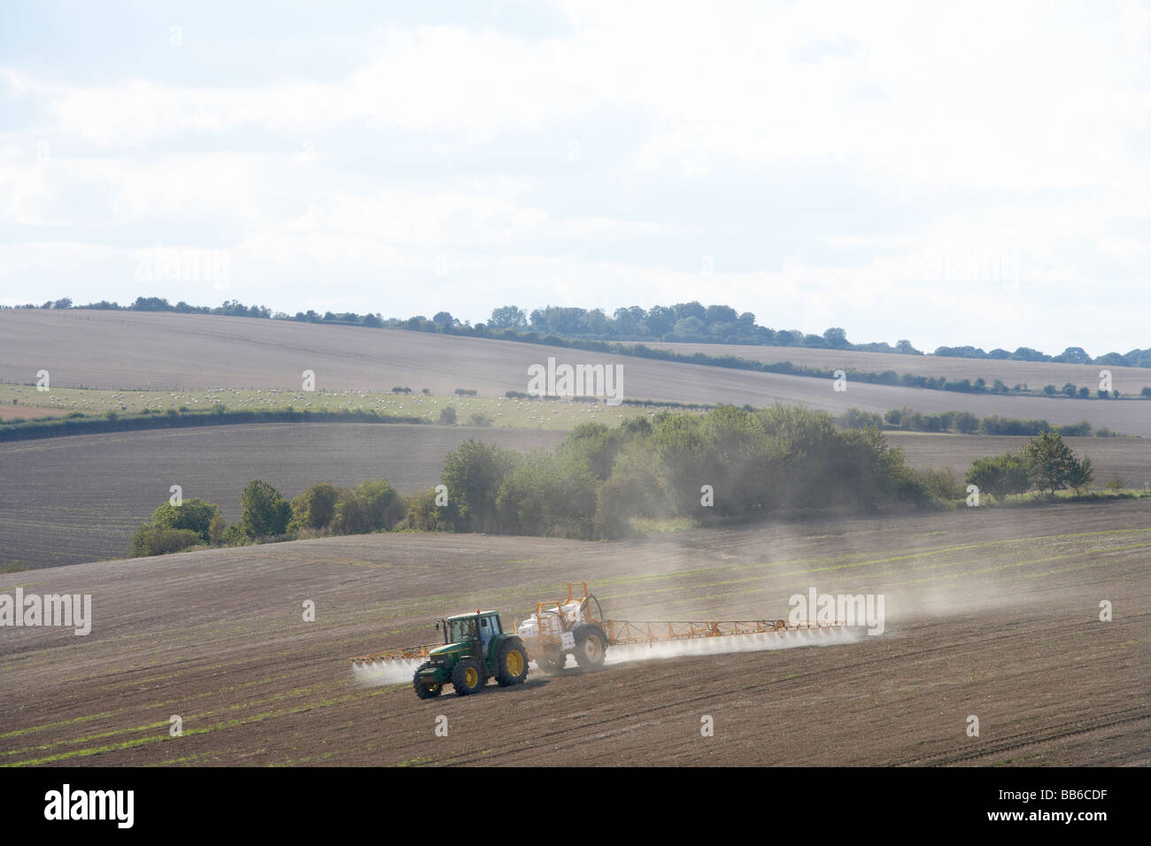 Tractor Spraying Field Stock Photo - Alamy