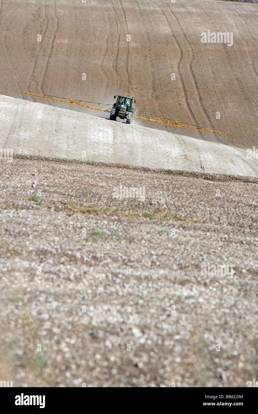 Tractor Spraying Field Stock Photo - Alamy