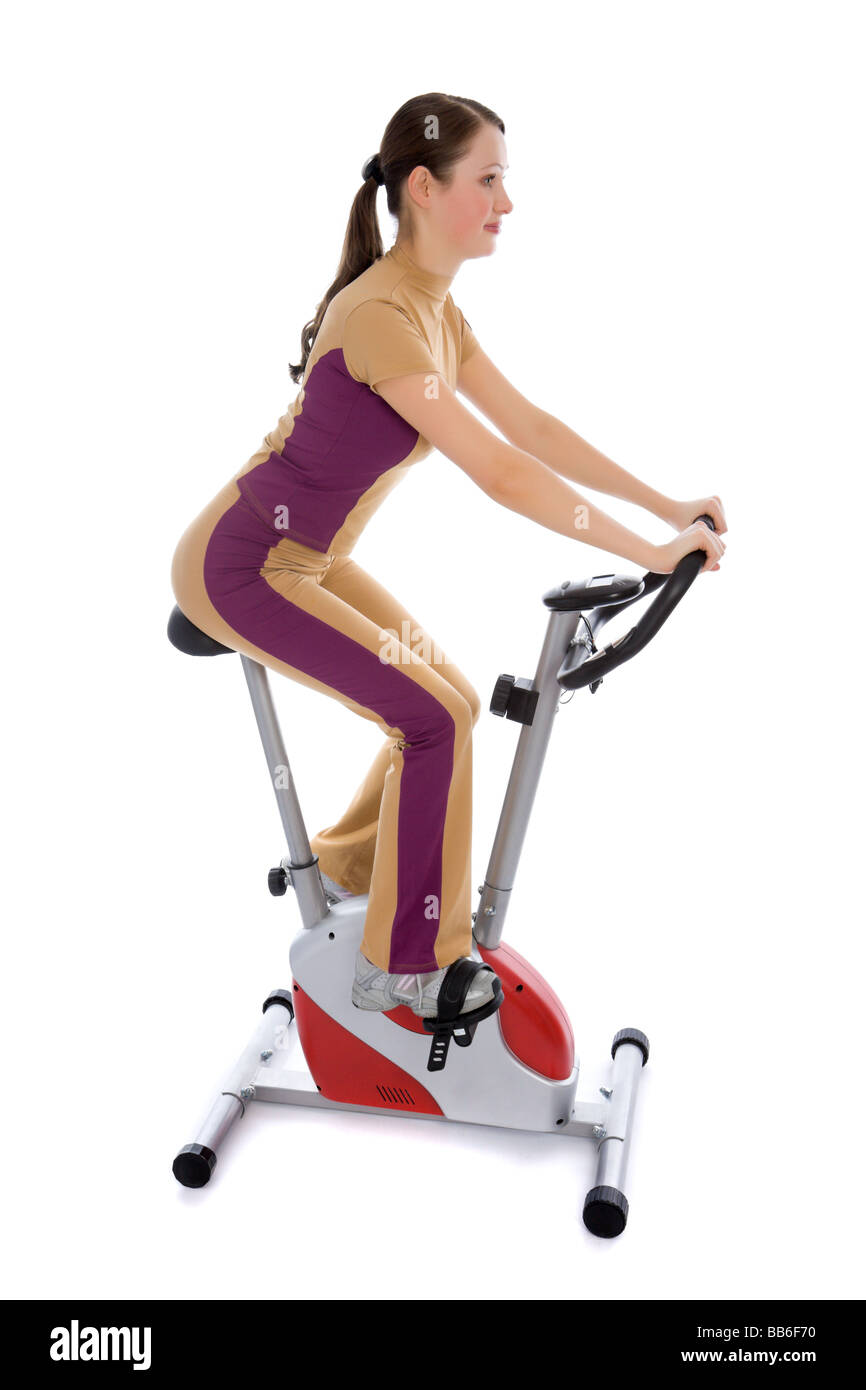 Girl exercise bike fitness health woman slim cycling hi-res stock ...