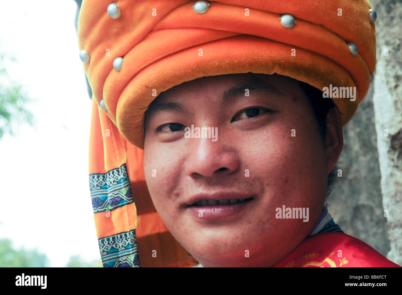 China Yunnan province Kunming Man in traditional dress Stock Photo - Alamy