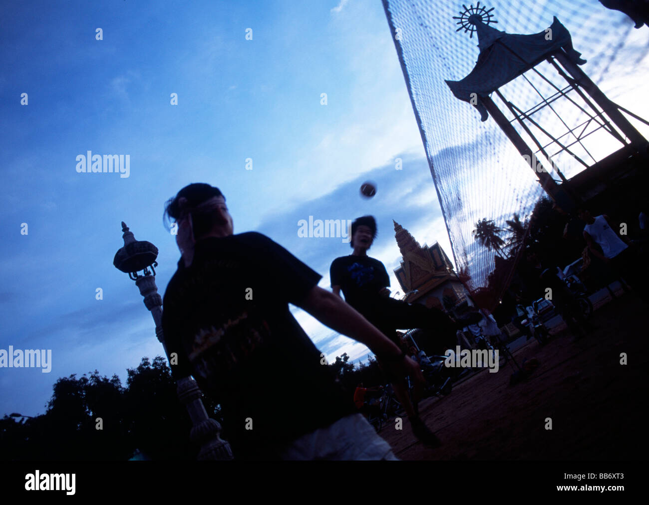 kids playing Sepak takraw on beach Stock Photo - Alamy