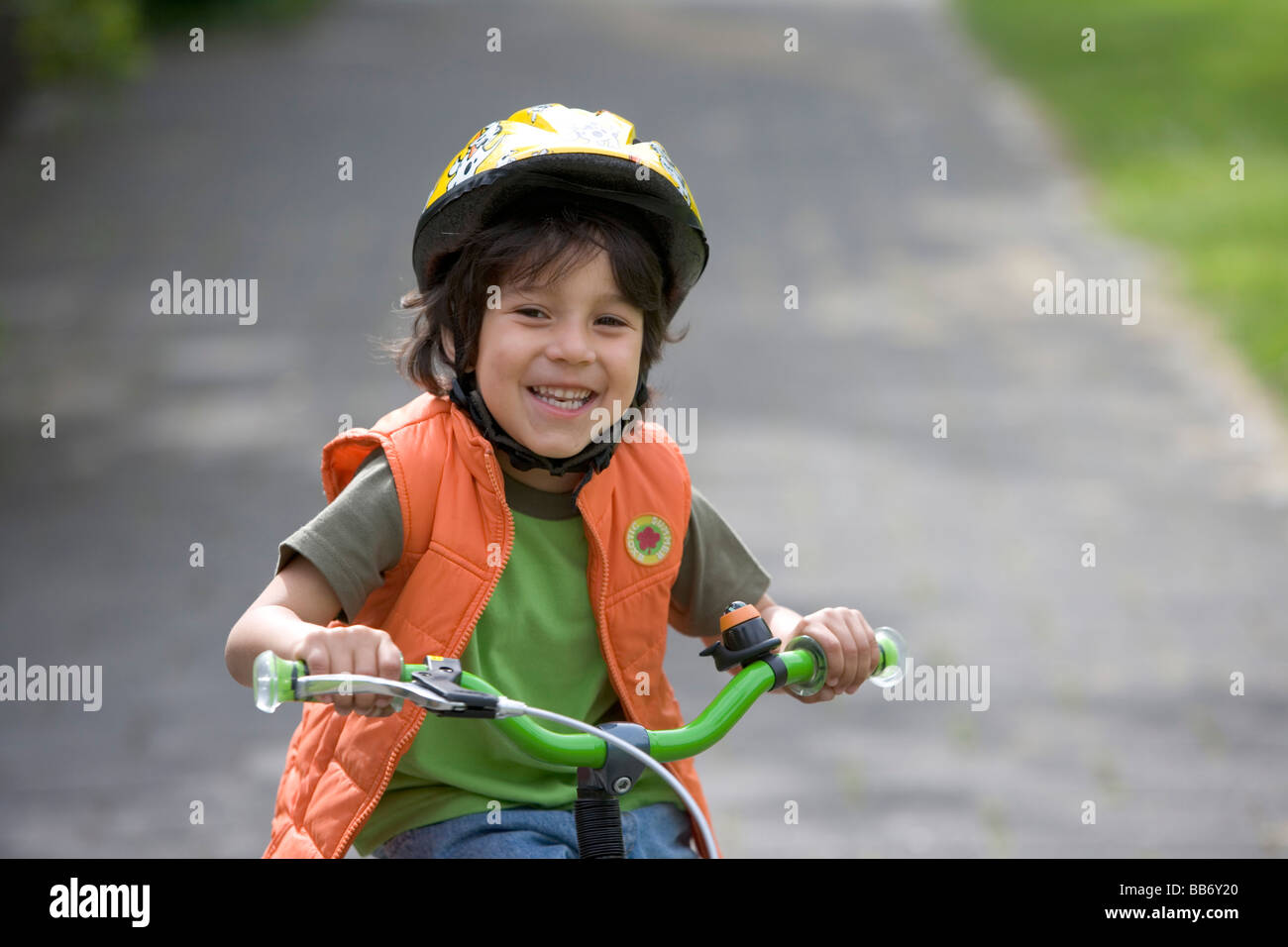 Little boy riding a bike Stock Photo - Alamy