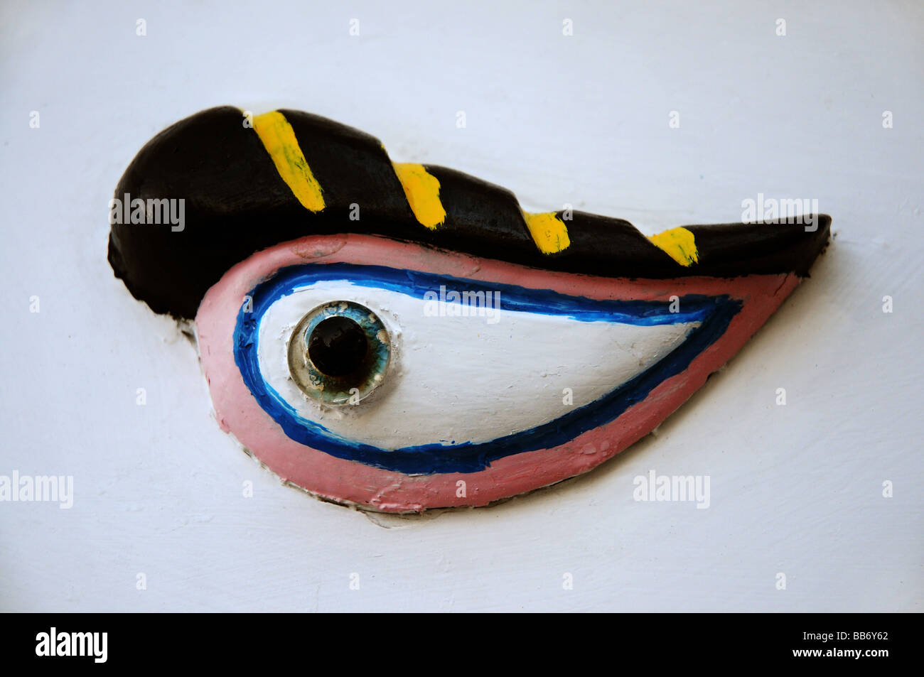 Plaster Eye on a wall Stock Photo - Alamy