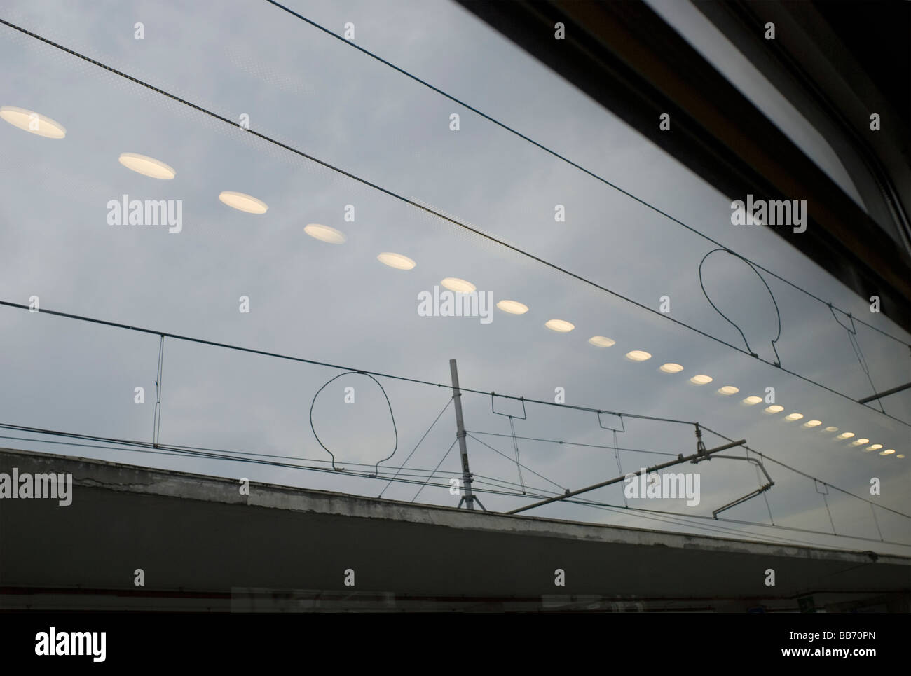 view from train window in the evening Stock Photo - Alamy