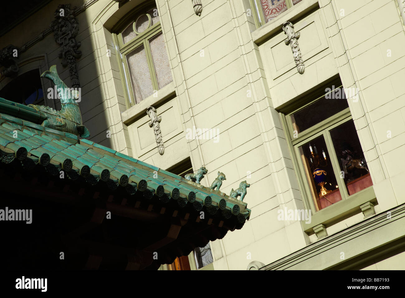Chinese style roof with office block behind Stock Photo - Alamy