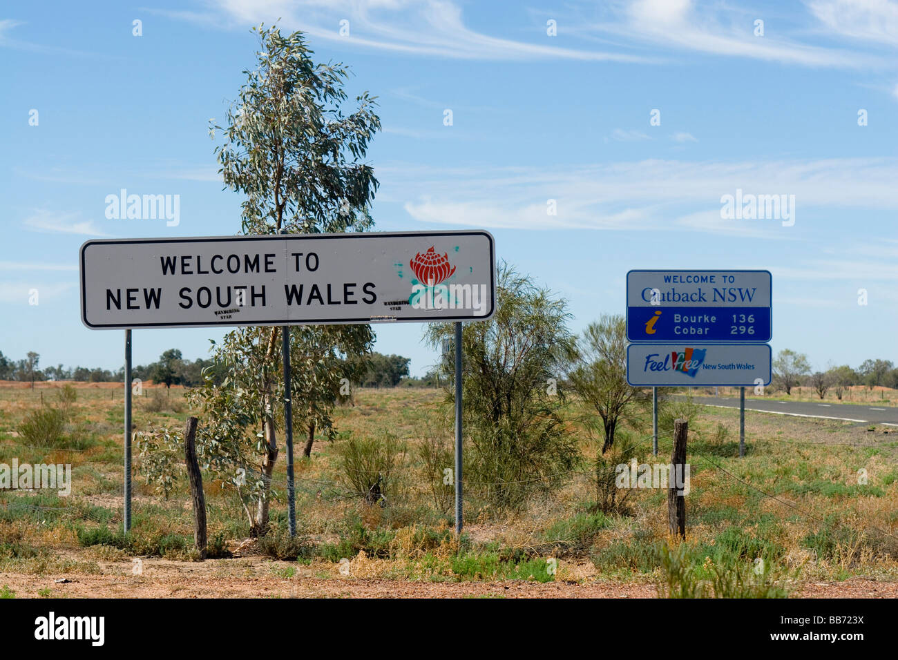A sign welcoming people to Outback New South Wales on the border with ...
