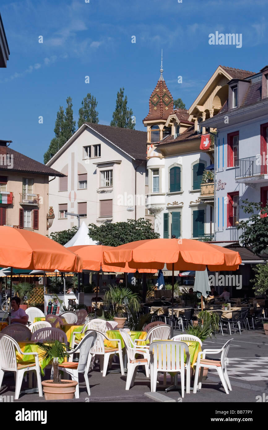 TABLES OUTSIDE A RESTAURANT IN THE CENTRE OF INTERLAKEN SWITZERLAND ...