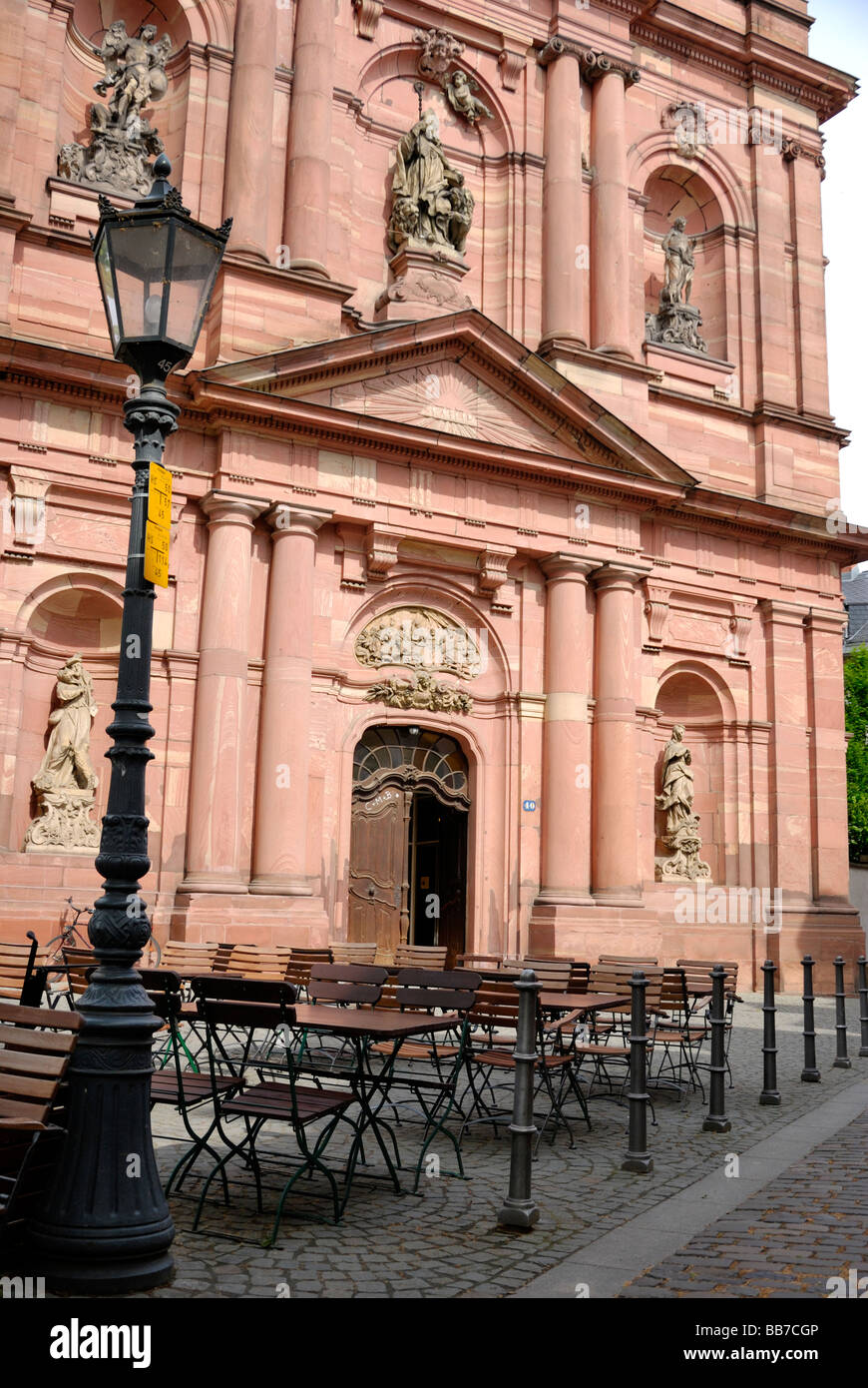 Old church with statues and old-fashioned lamp post Stock Photo - Alamy