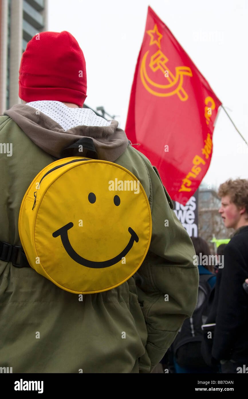 Communist Party flag juxtaposed with Smiley face backpack Stock Photo ...