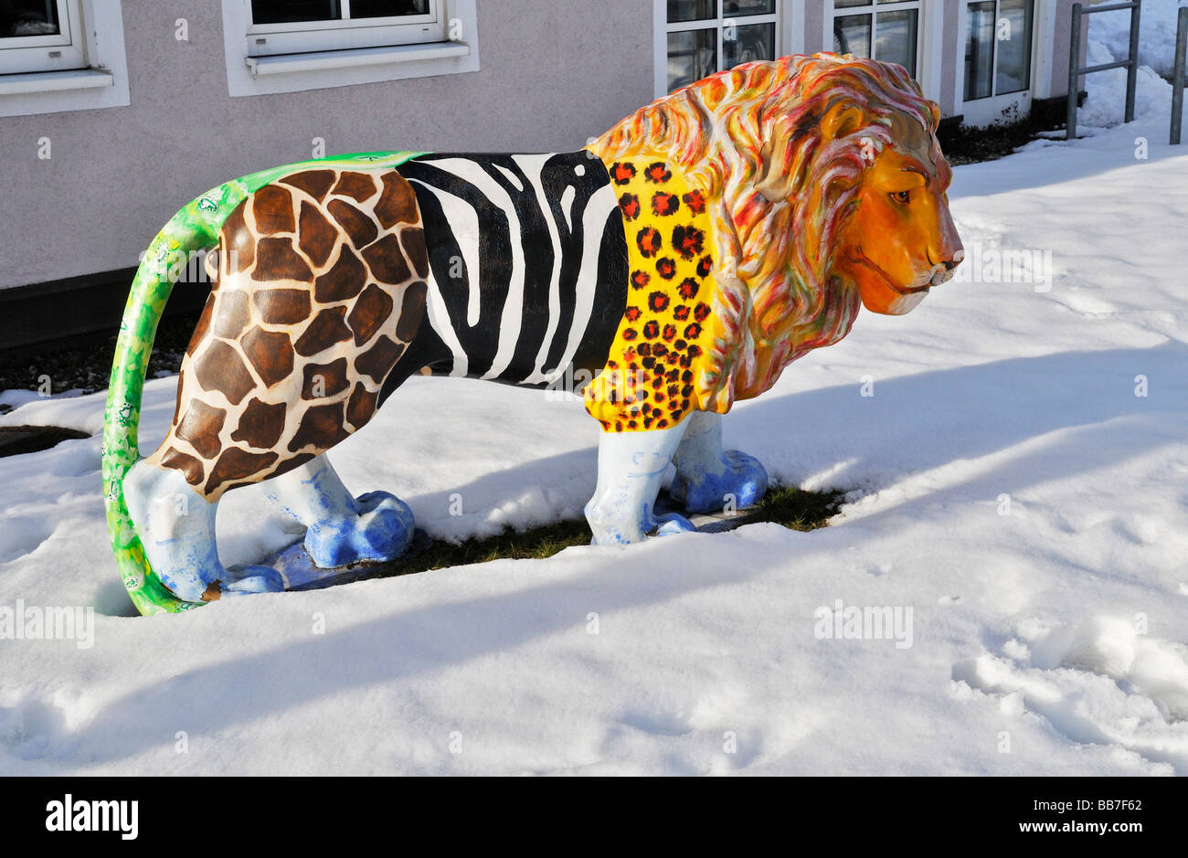 Lion statue in snow, Loewenparade, Lion Parade, Munich, Bavaria ...