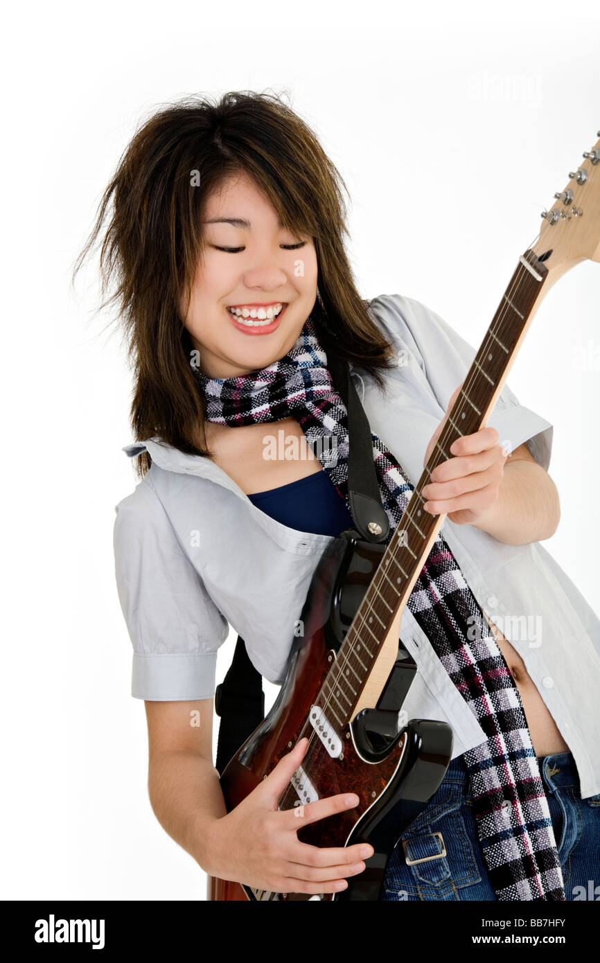 Caucasian teenager posing as a punk rocker on white background Stock ...