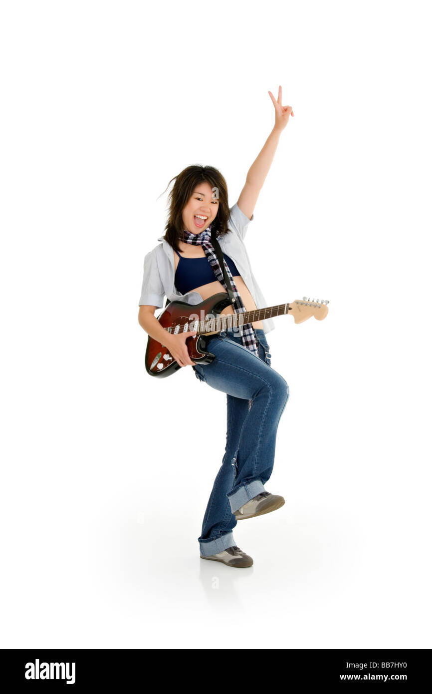 Caucasian teenager posing as a punk rocker on white background Stock ...