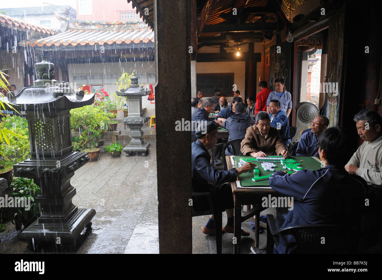 Local people play mahjong at an ancestral hall in Quanzhou, Fujian ...