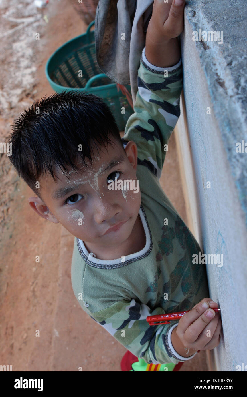 child writing on a wall Stock Photo - Alamy
