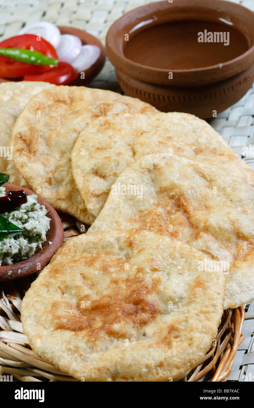 Urad dal Puri is a Central Indian puffed deep-fried flatbread Stock ...