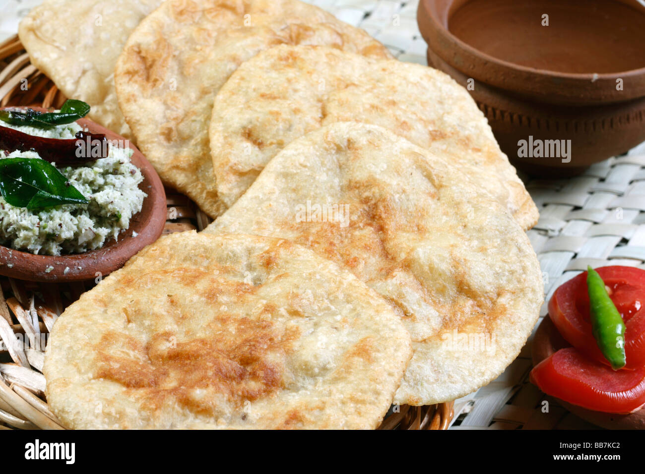 Urad dal Puri is a Central Indian puffed deep-fried flatbread Stock ...