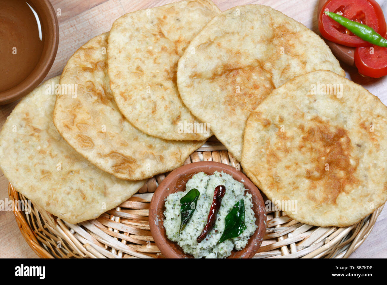 Urad dal Puri is a Central Indian puffed deep-fried flatbread Stock ...