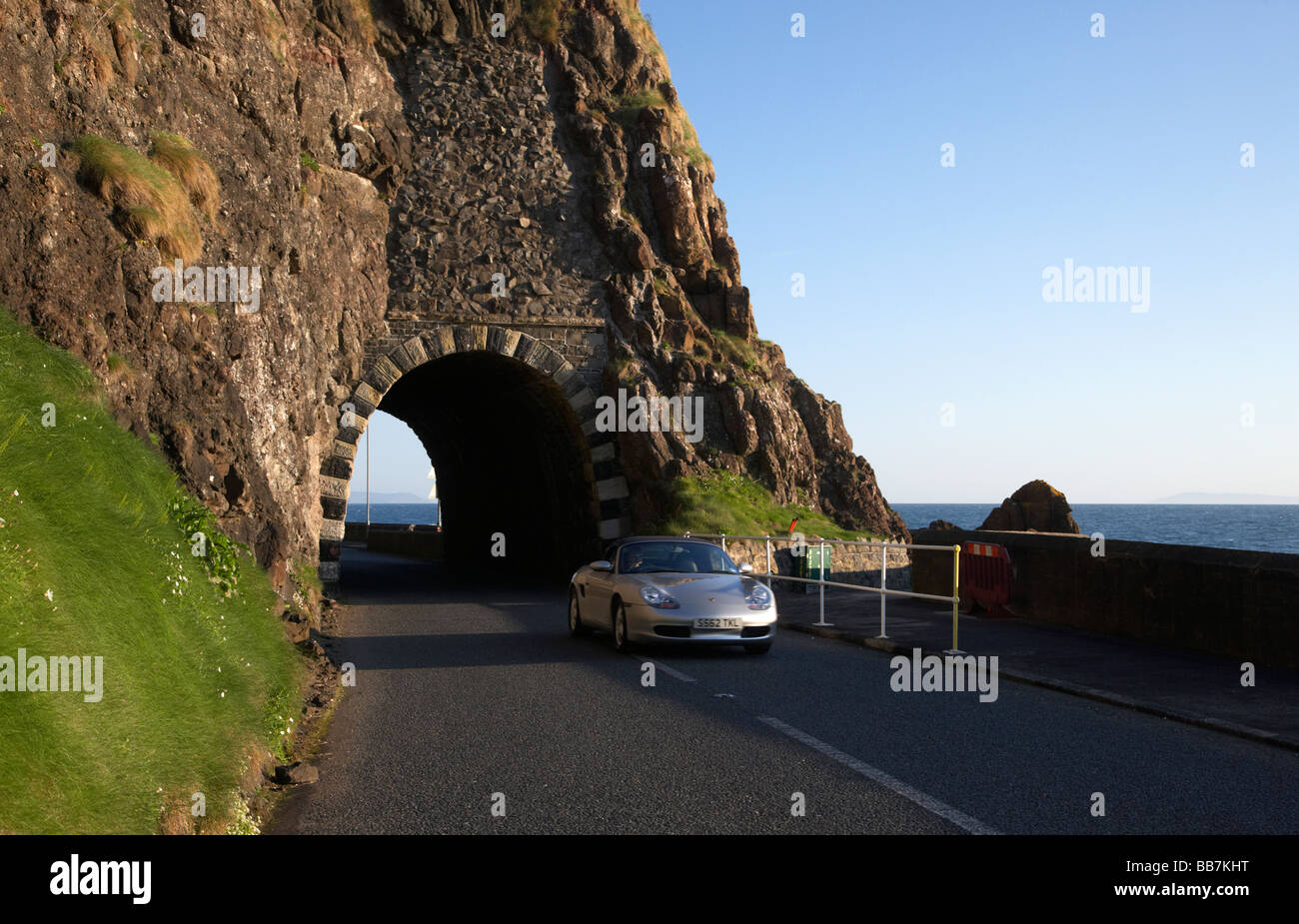 porsche car on the the A2 causeway coastal route coast road passes ...