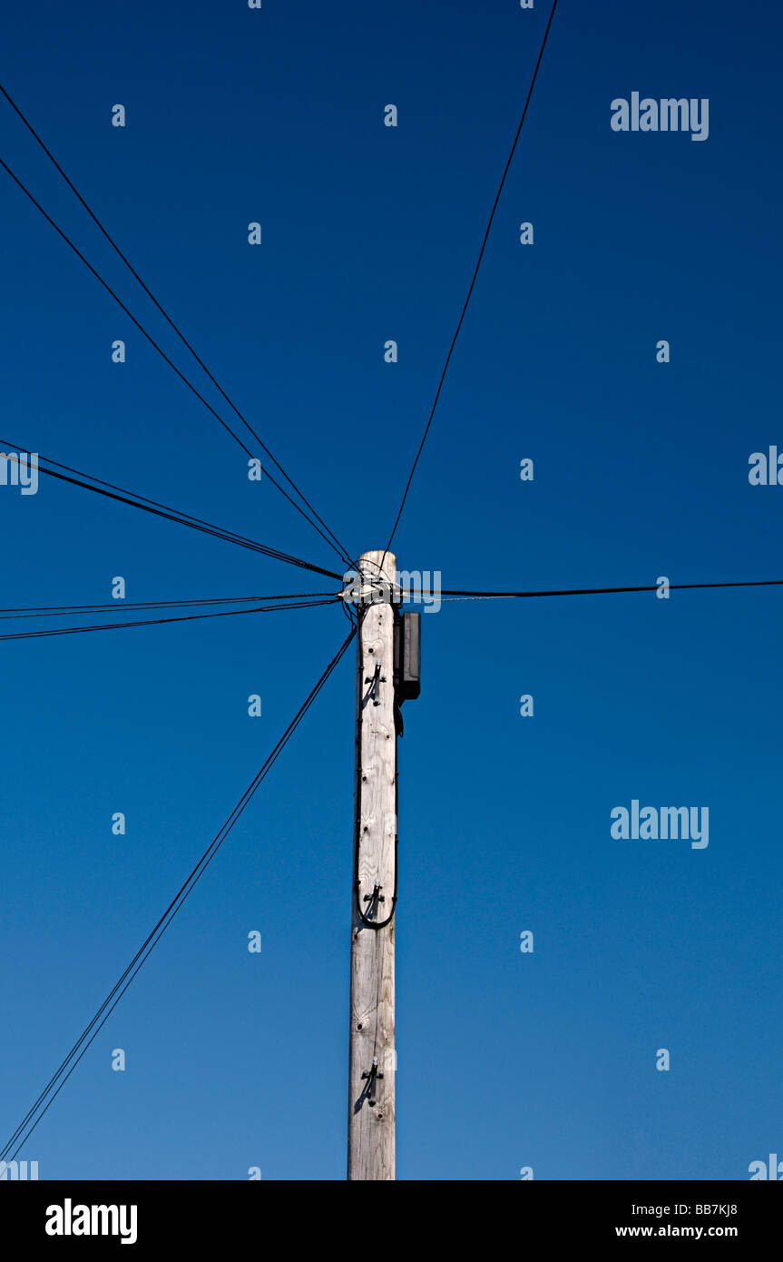telephone line pole on a uk street corner Stock Photo - Alamy