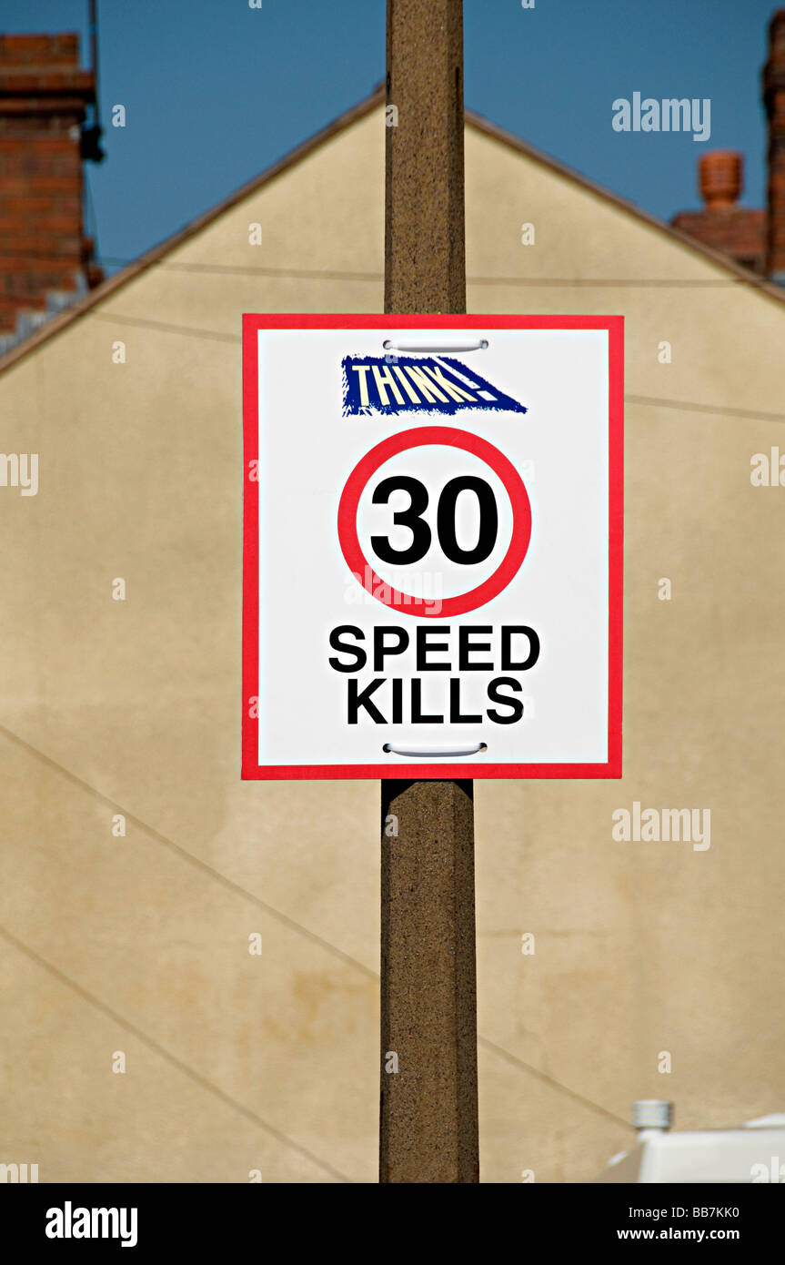 speed kills road thirty sign limit 30 warning message Stock Photo - Alamy