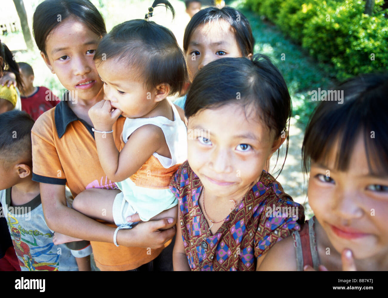 Asian children smiling, Laos Stock Photo - Alamy