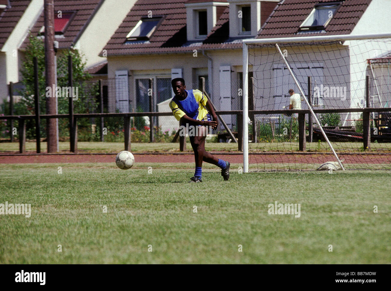 French students, gym class, playing soccer, soccer player, soccer ...