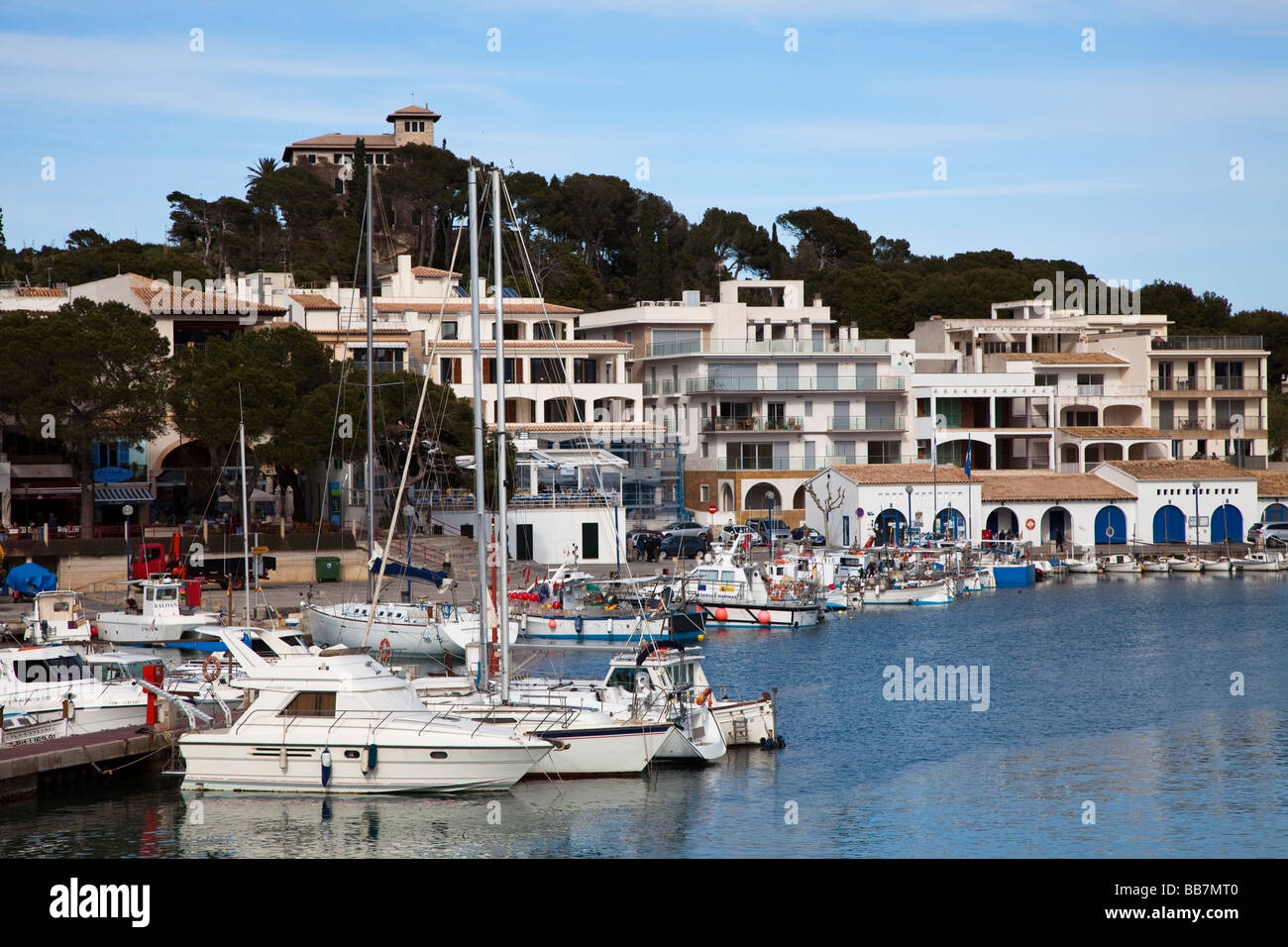 Boats in harbour and coastal development Cala Rajada Mallorca Spain ...