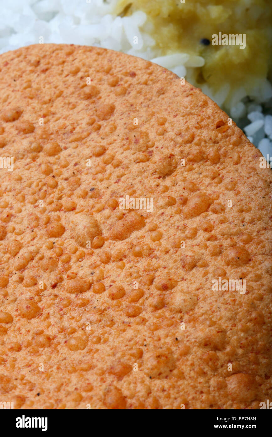 Papad is a thin, crispy Indian preparation sometimes described as a ...