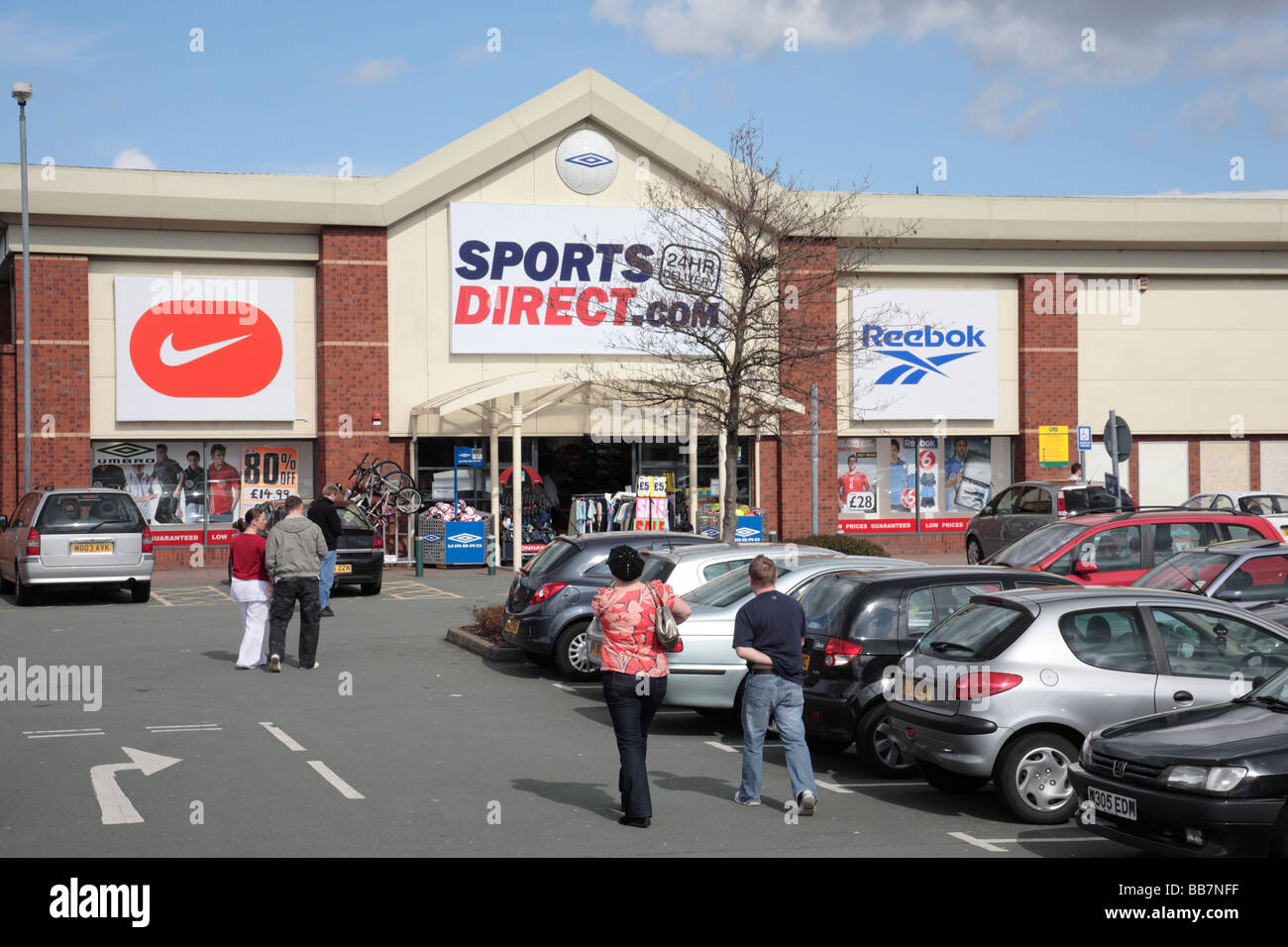 Shoppers going into Sports Direct store Stock Photo - Alamy