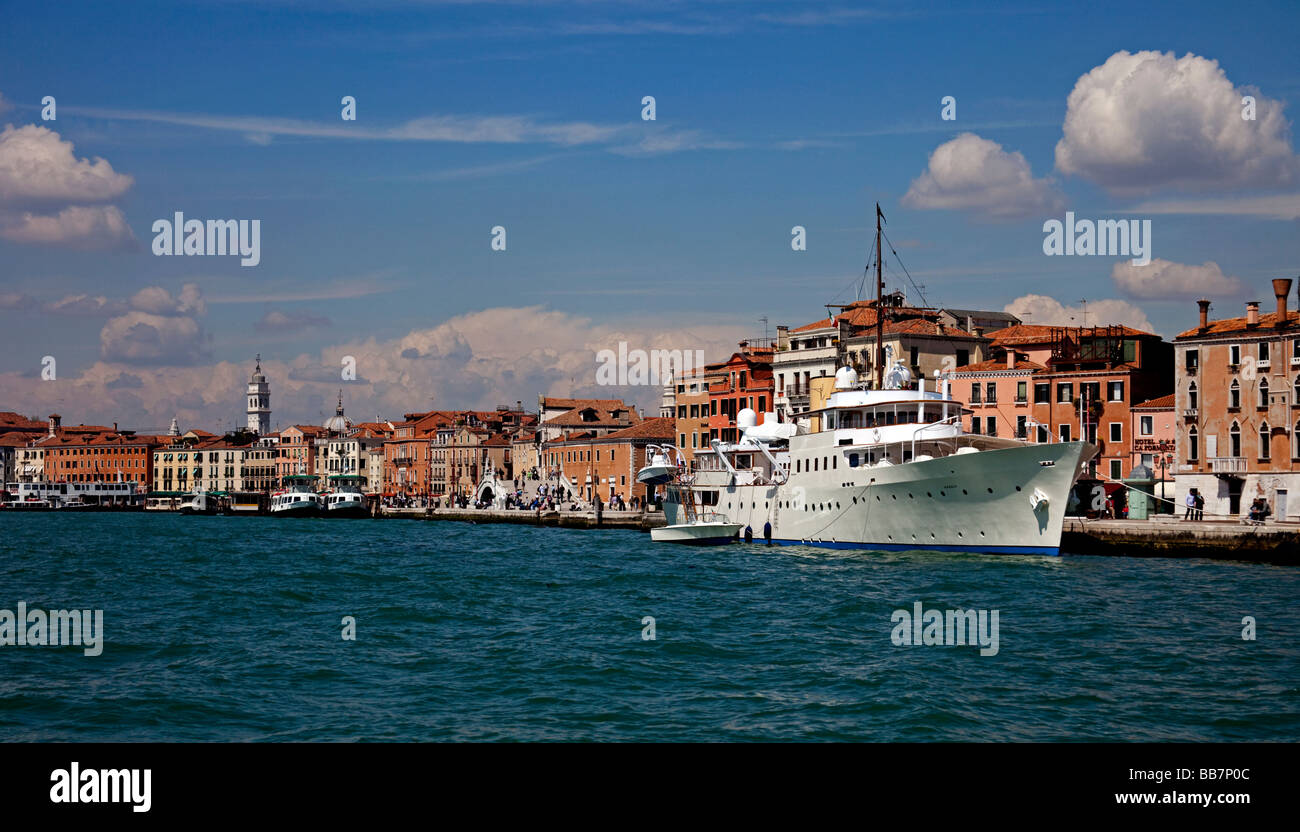 Cruise ship in foreground with city waterfront of Venice Italy in ...