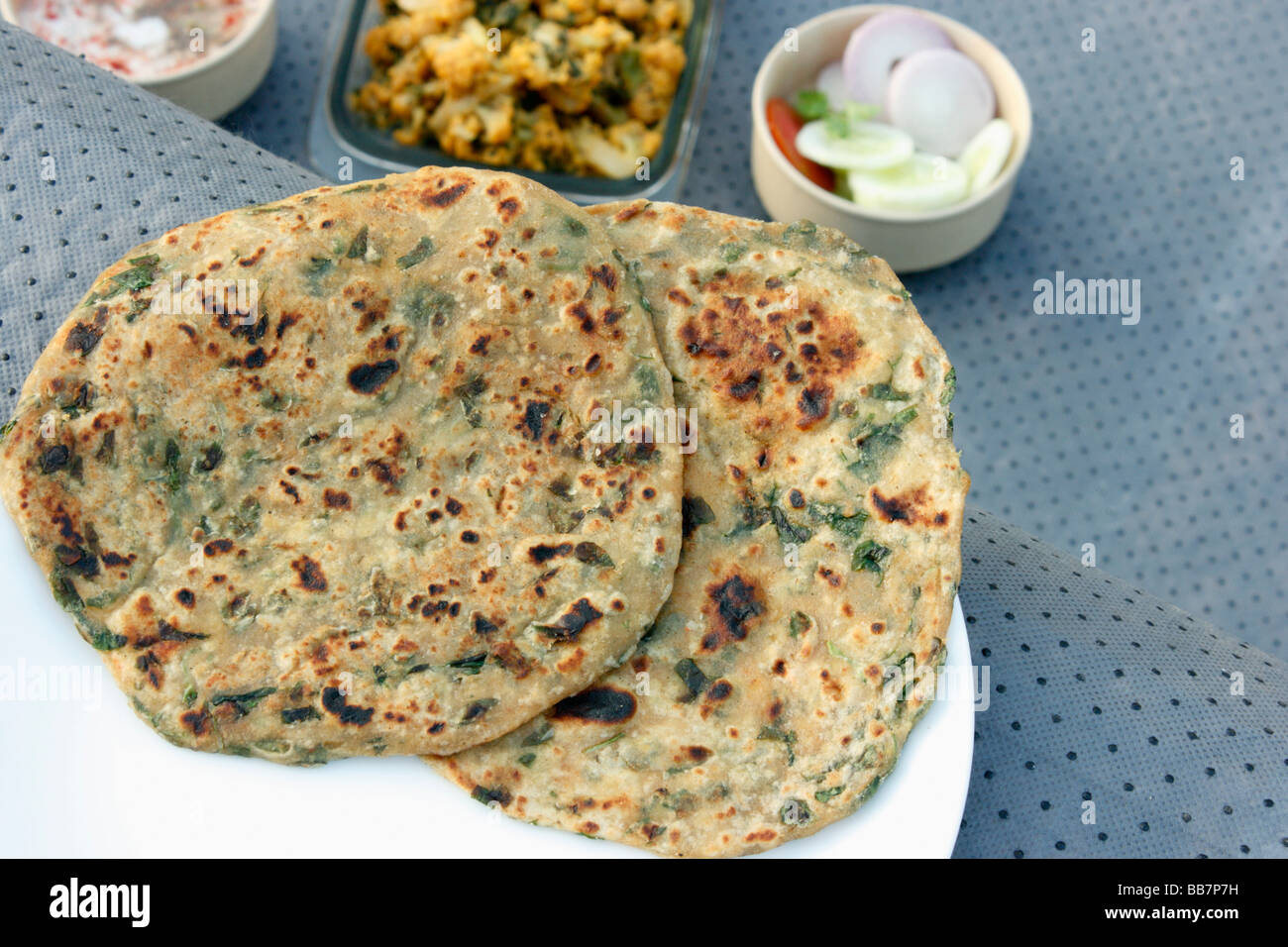 Methi Paratha is a stuffed flatbread made with fenugreek leaves Stock ...