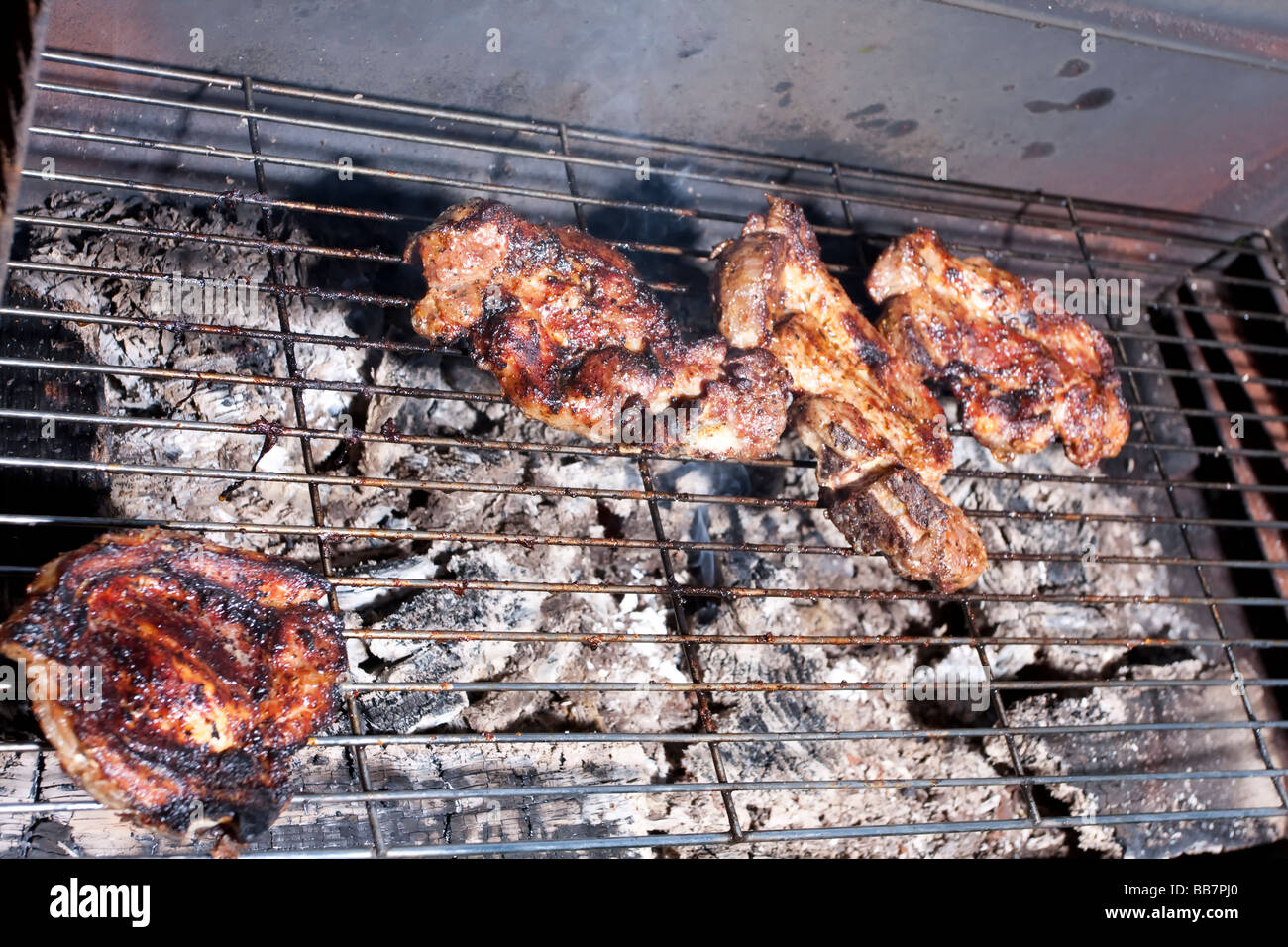 Pork on grill Stock Photo - Alamy