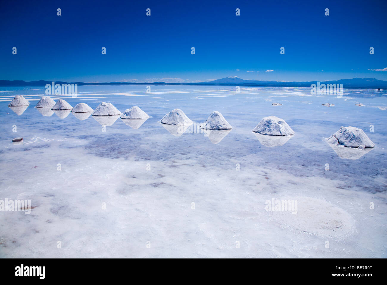 Bolivia Southern Altiplano Salar de Uyuni Cones of salt stacked on the ...