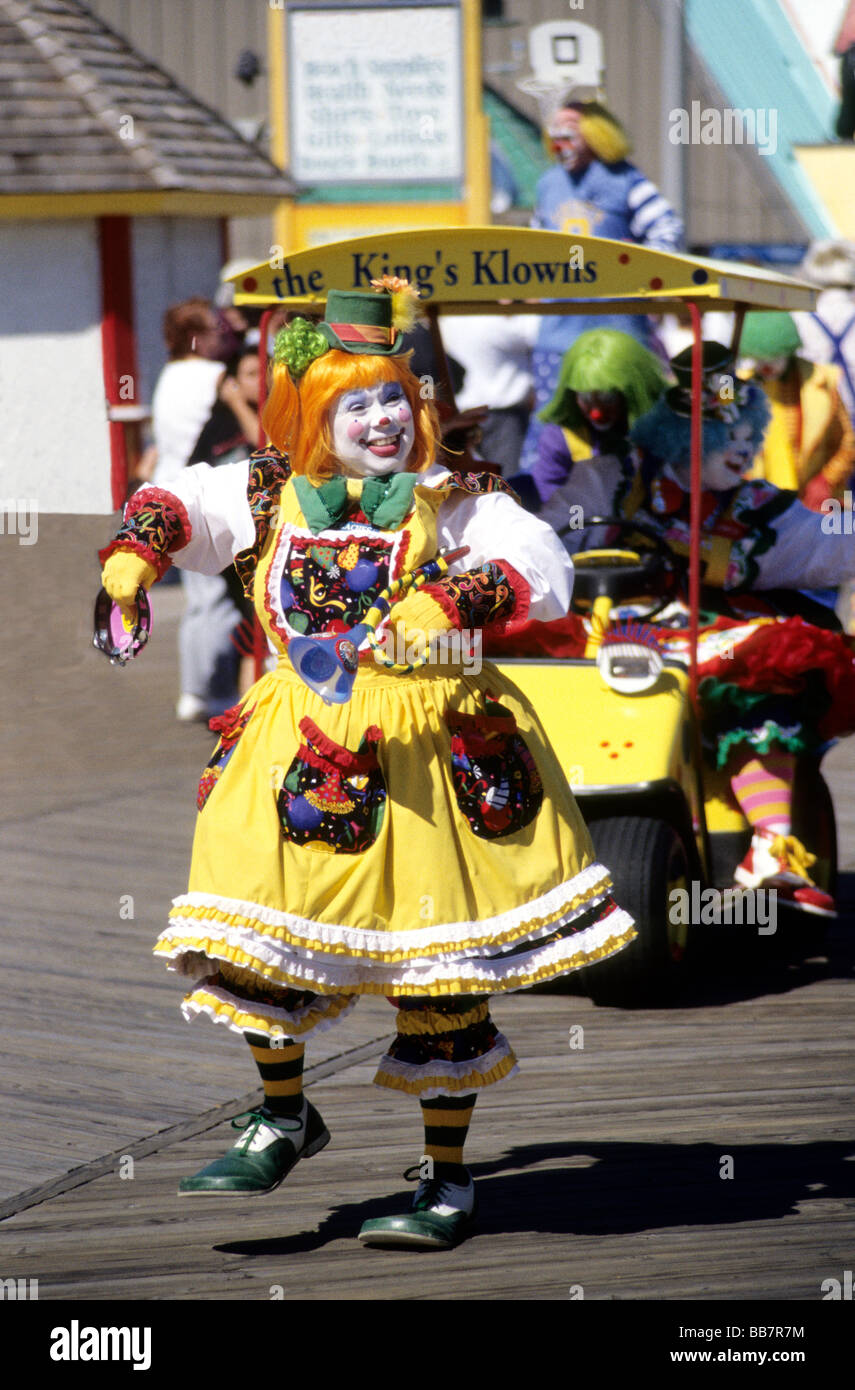 Female clown strutting down the boardwalk in Clownfest parade Stock ...