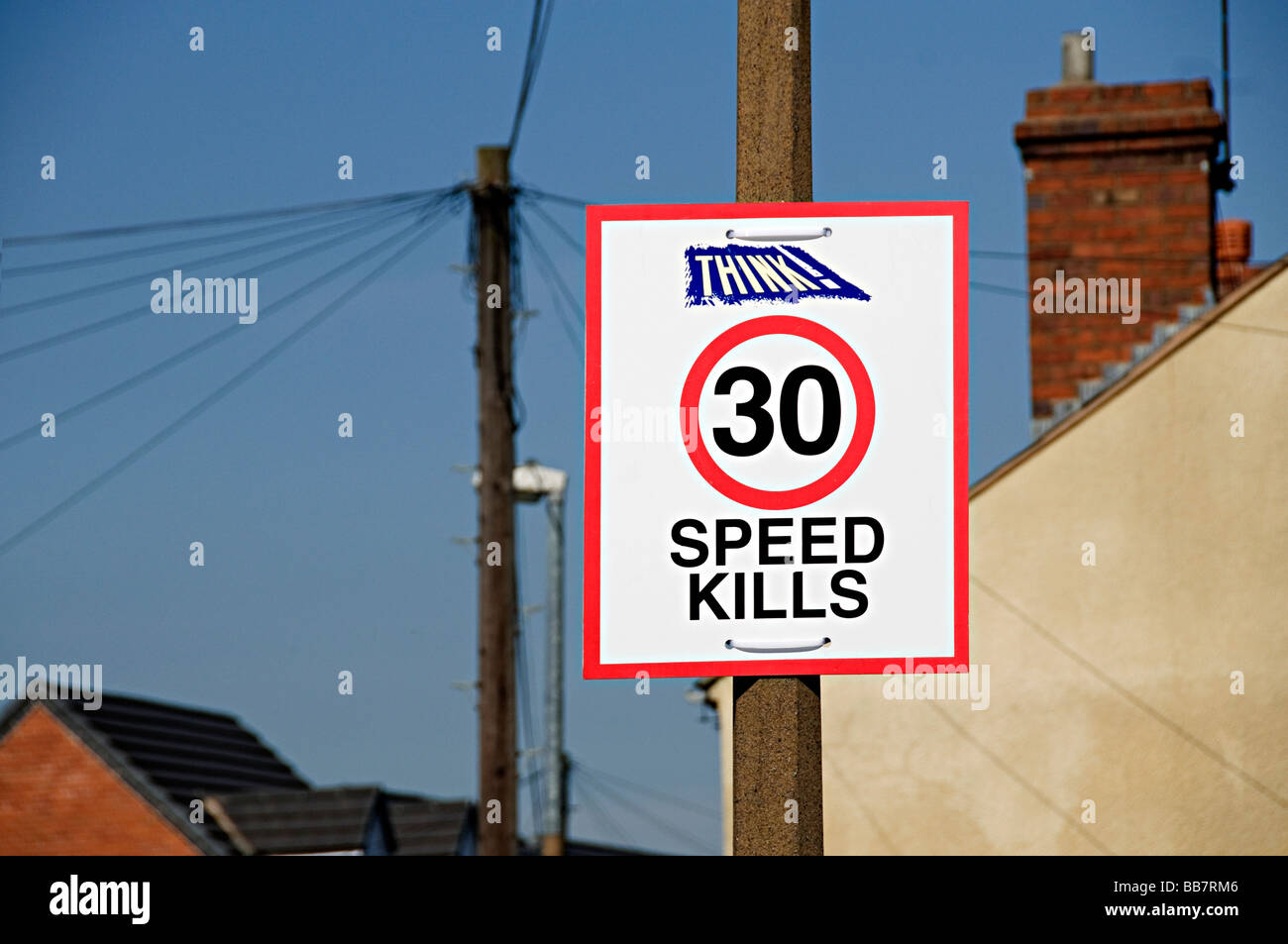 speed kills road thirty sign limit 30 warning message Stock Photo - Alamy
