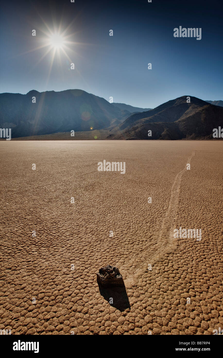 Moving rock on salt flats at The Racetrack in Death Valley National ...