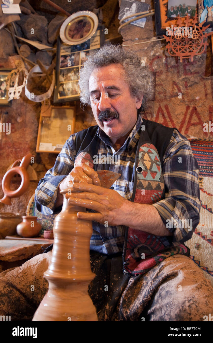 Potter at a manual pottery wheel in Cappadocia Turkey Stock Photo - Alamy