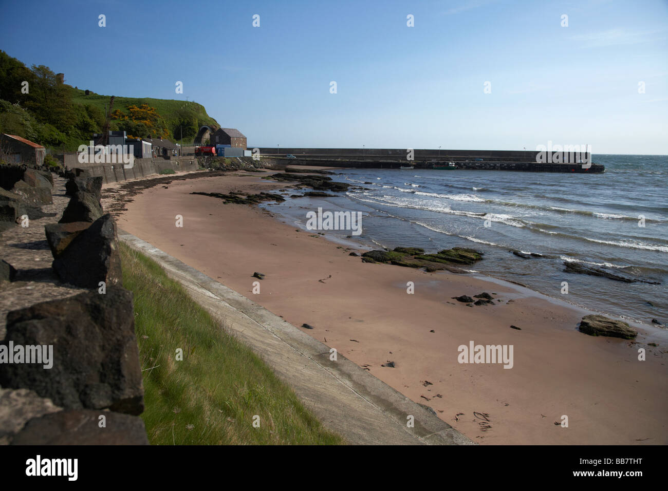 Red bay beach and pier with red basalt sand county antrim northern ...