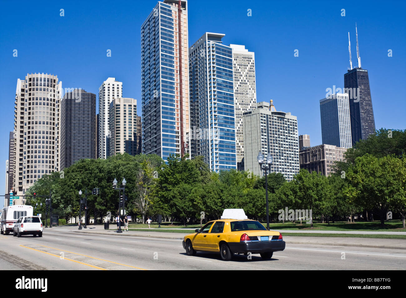 Yellow taxi in downtown Chicago IL Stock Photo - Alamy