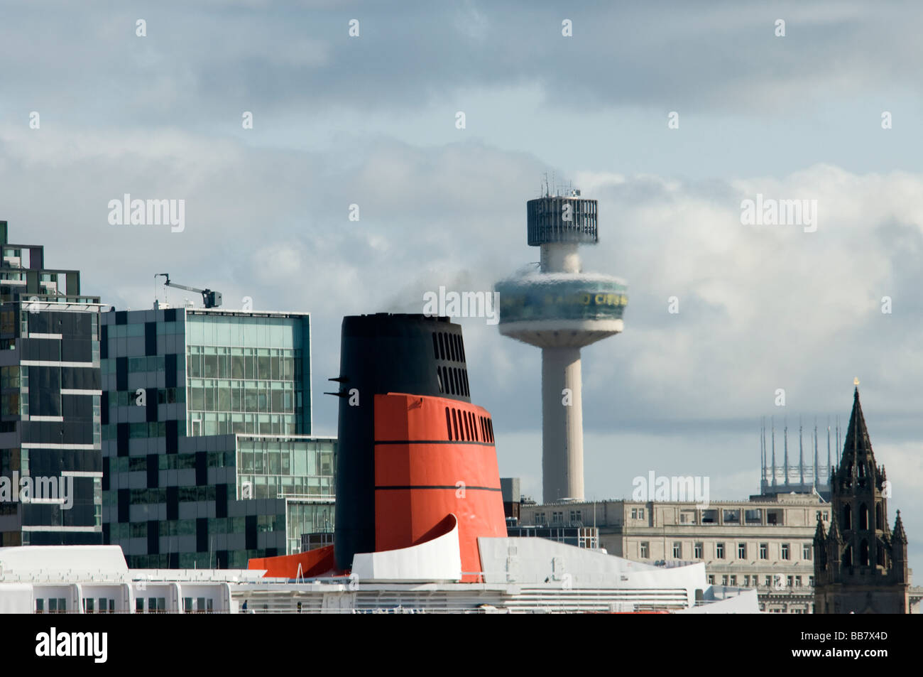 Funnel of QE2 against Liverpool Skyline Stock Photo - Alamy