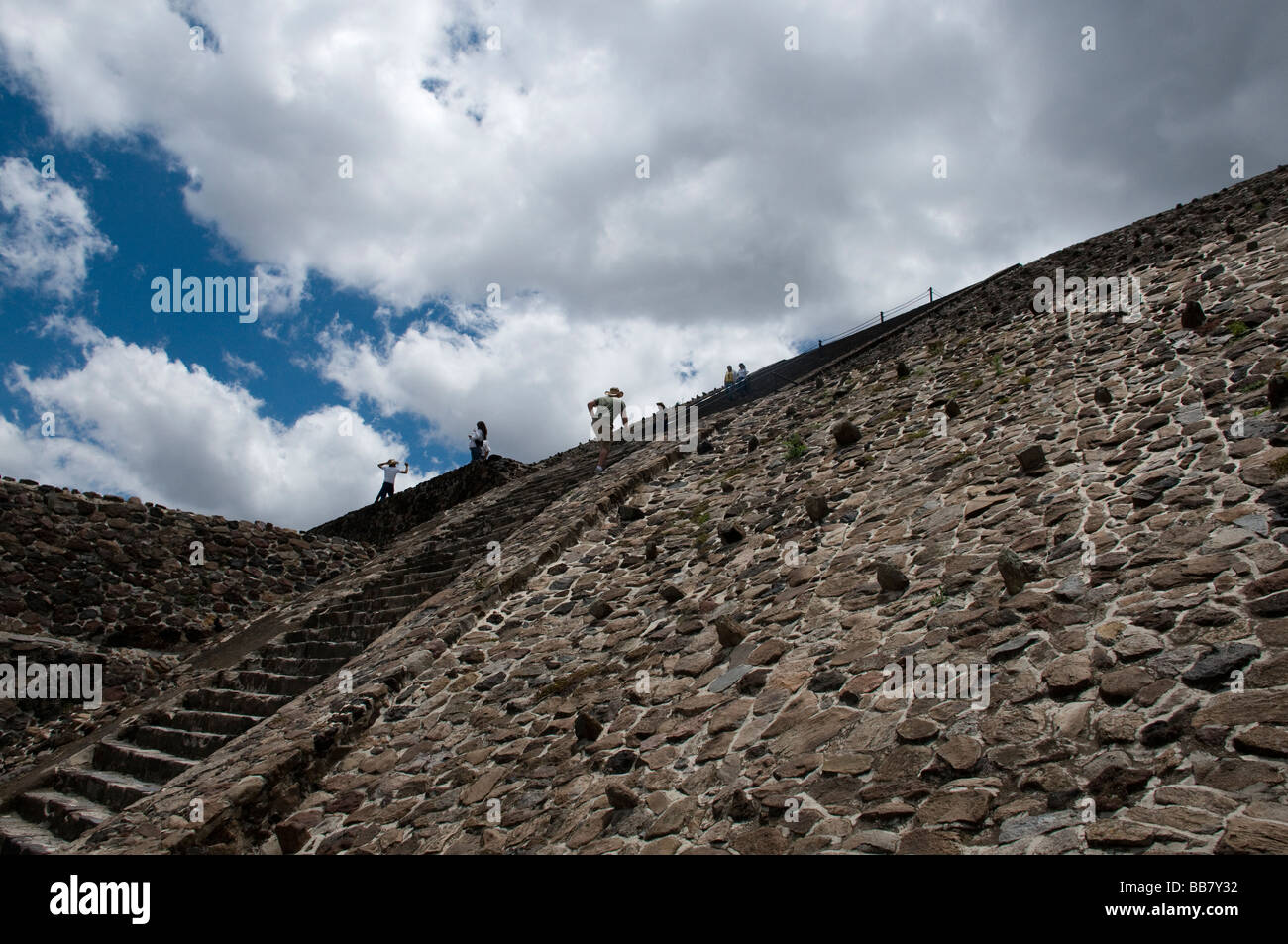 Tourists climb the pyramid of the sun hi-res stock photography and ...