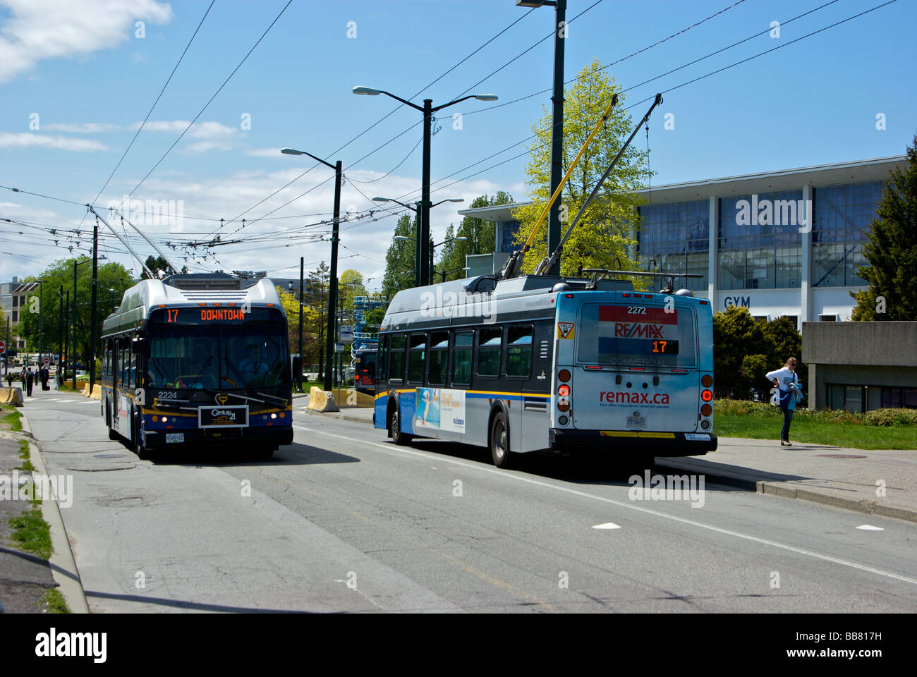 Two Vancouver electric trolley public transit buses Stock Photo - Alamy