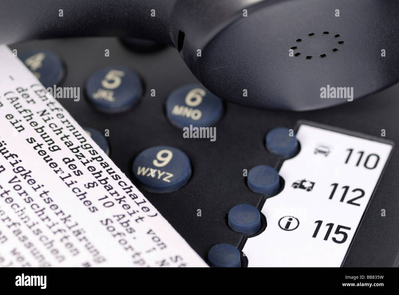 Telephone with the German central number for public authorities 115 ...