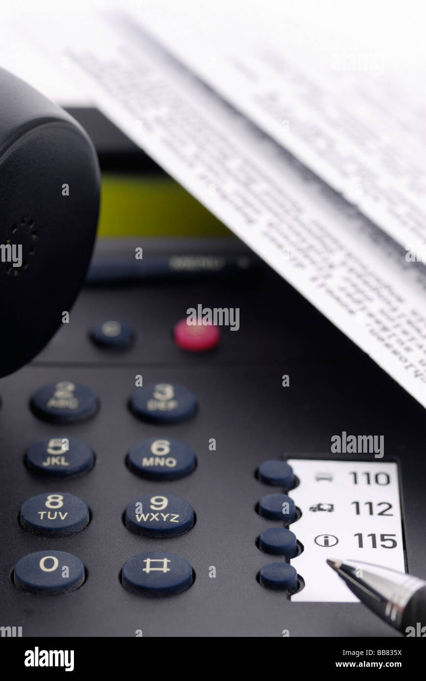 Telephone with the German central number for public authorities 115 ...