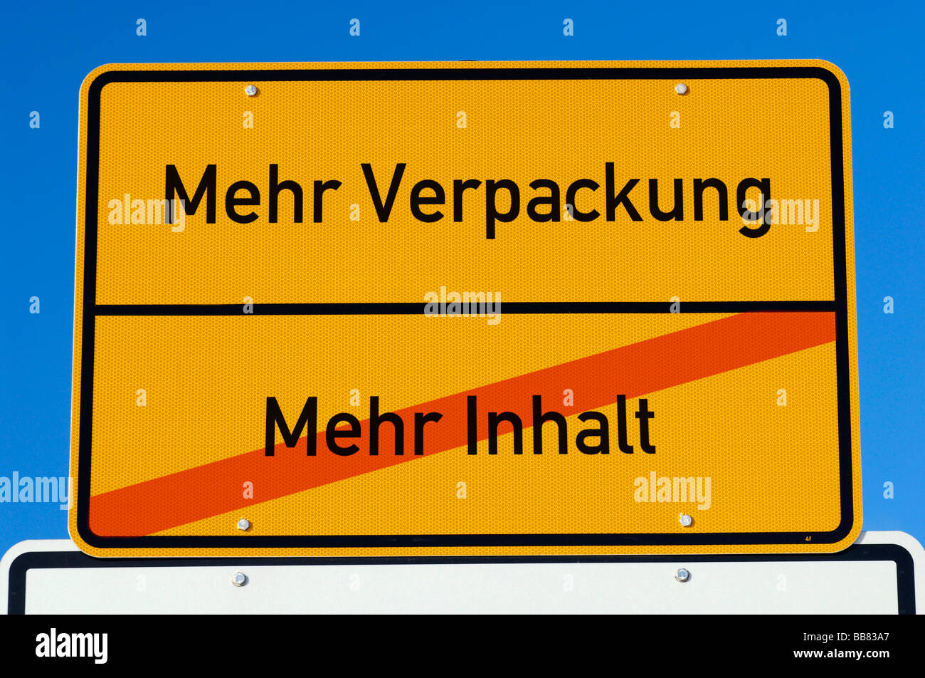Place name sign bearing the words "Mehr Verpackung Mehr Inhalt", German ...
