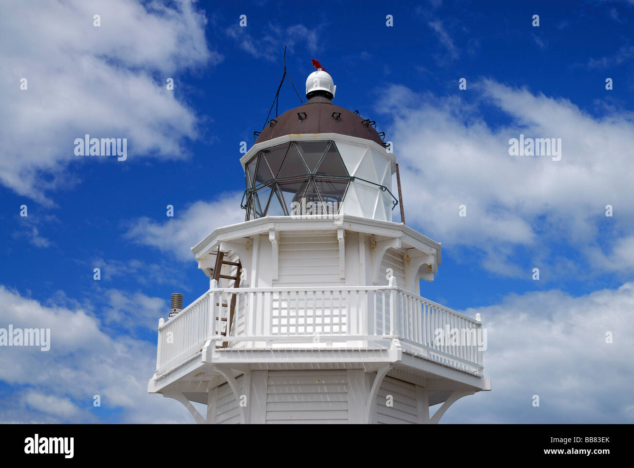 Blue sky and clouds over Katiki Point Lighthouse near Moeraki, New ...