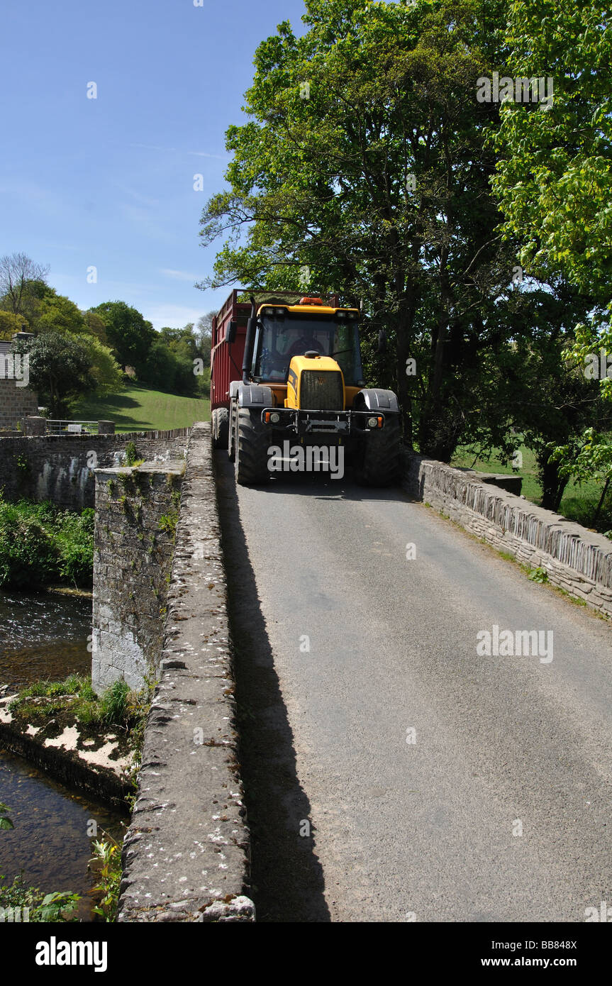sileage tractor crossing Nevern Bridge Stock Photo - Alamy