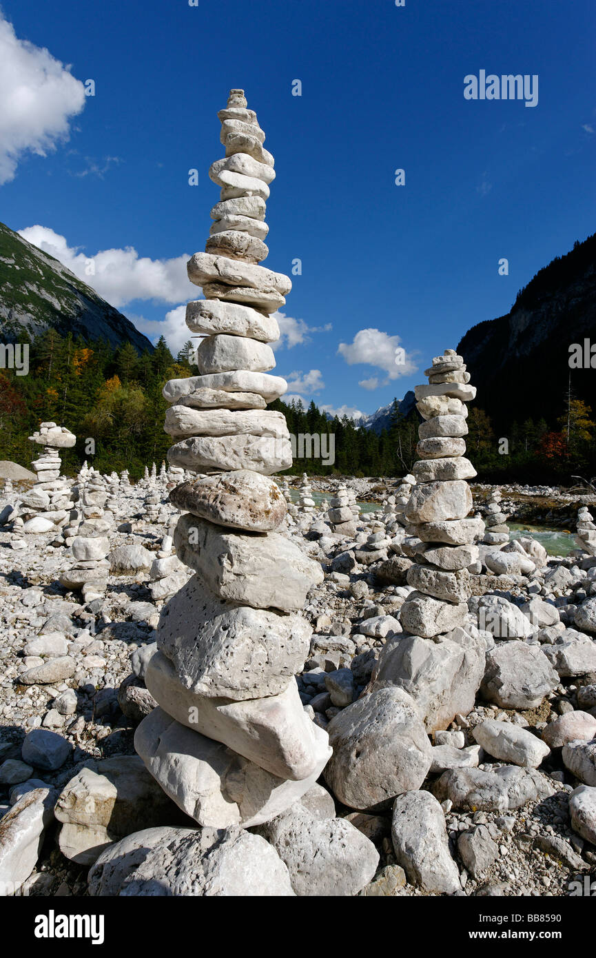 Stone hills, stone pyramids, stone men, Hinterautal, Isar spring valley ...